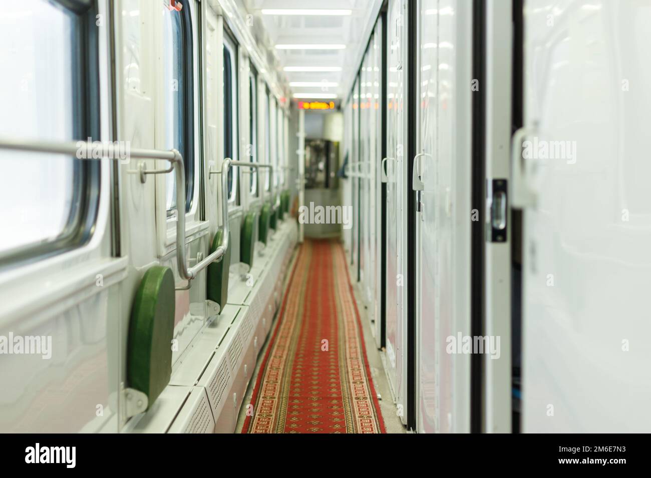 Sleeping car of a passenger train. Corridor inside the train car Stock ...