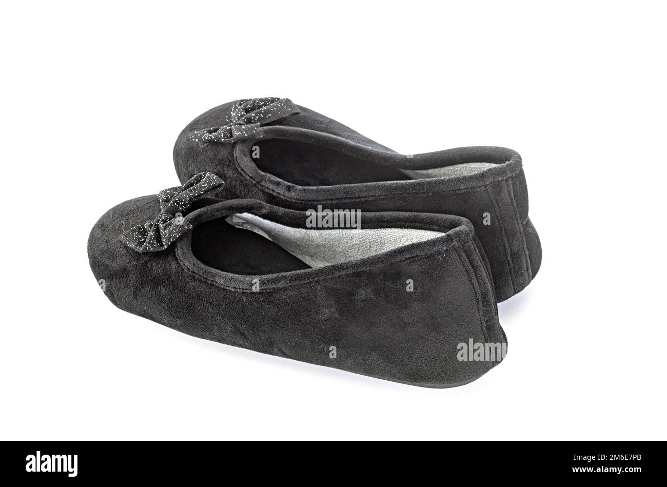 black velvet slippers in front of white background Stock Photo - Alamy
