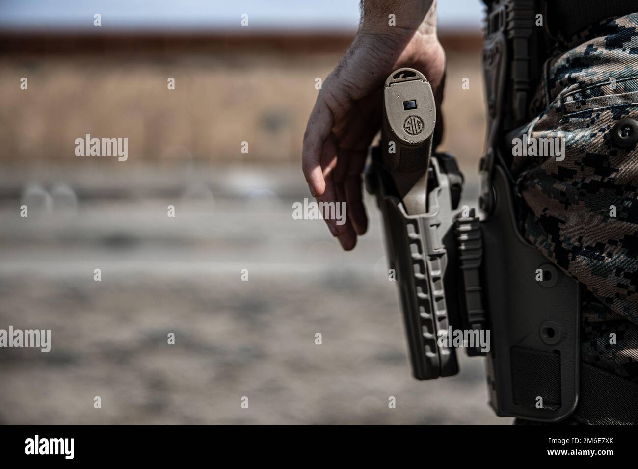 A U.S. Marine with Combat Marksmanship Coach Class 4-22, participates ...