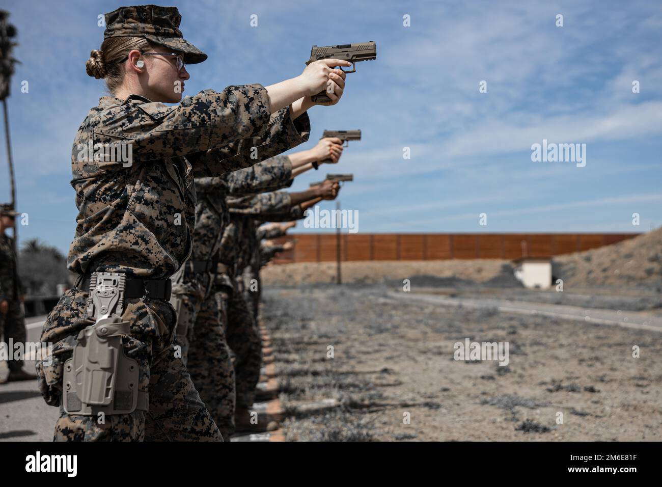 U.S. Marines with Combat Marksmanship Coach Class 4-22, participate in ...