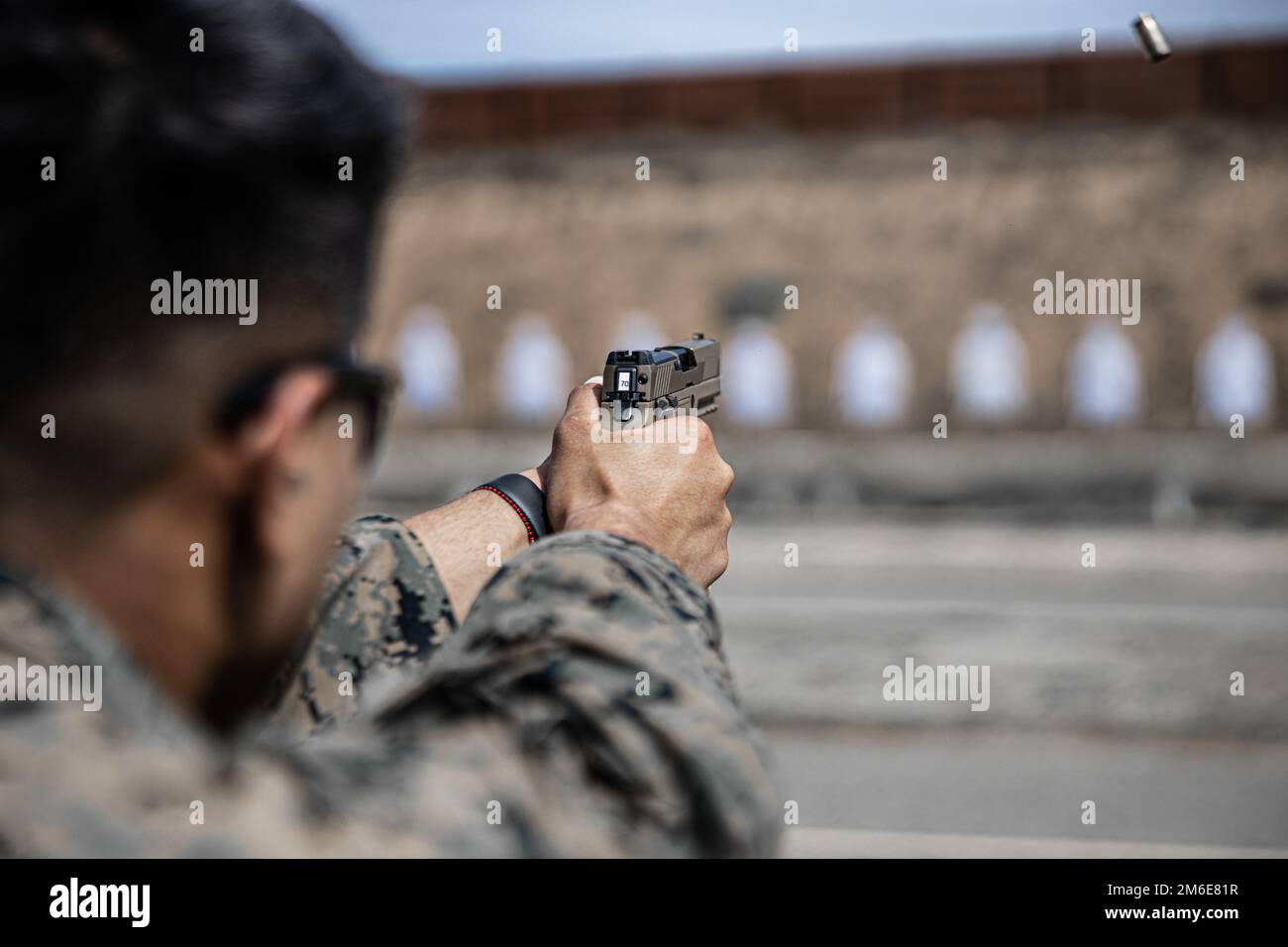 A U.S. Marine with Combat Marksmanship Coach Class 4-22, participates ...