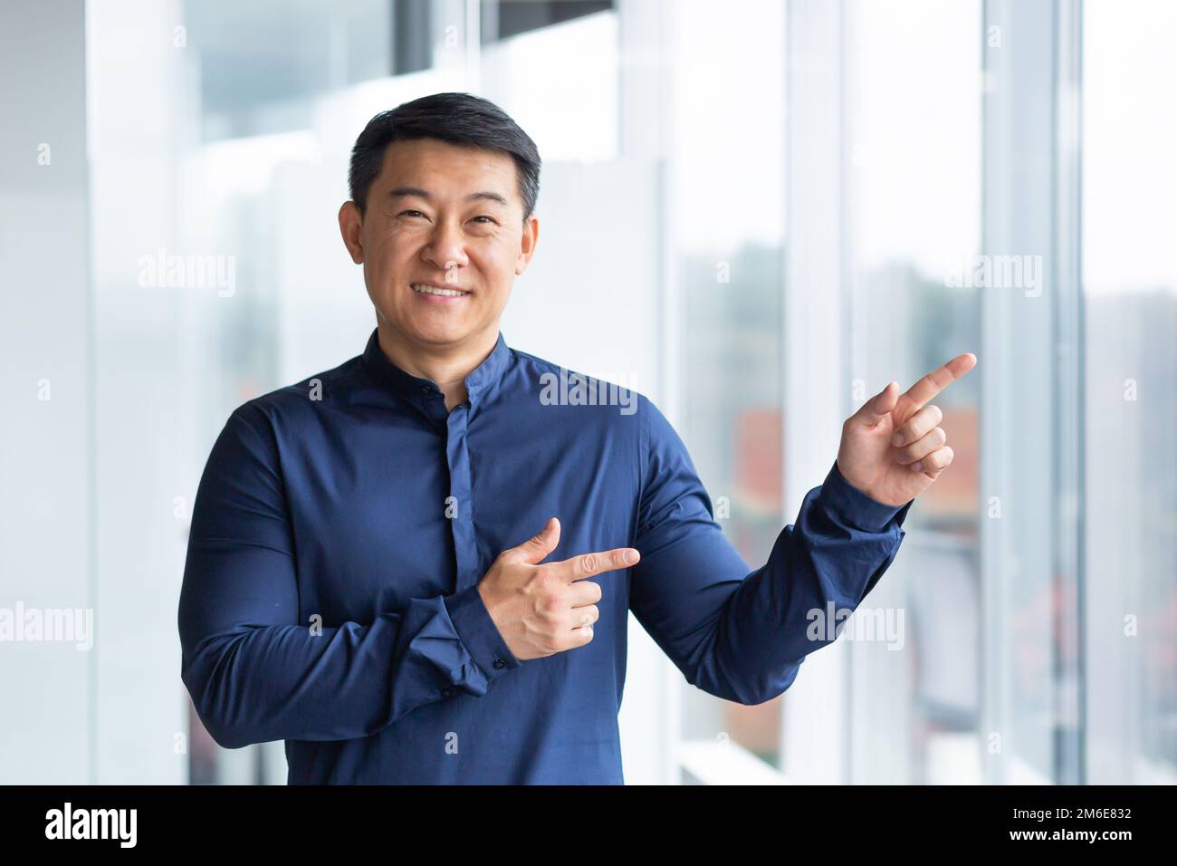 Japanese pointing finger hi-res stock photography and images - Alamy