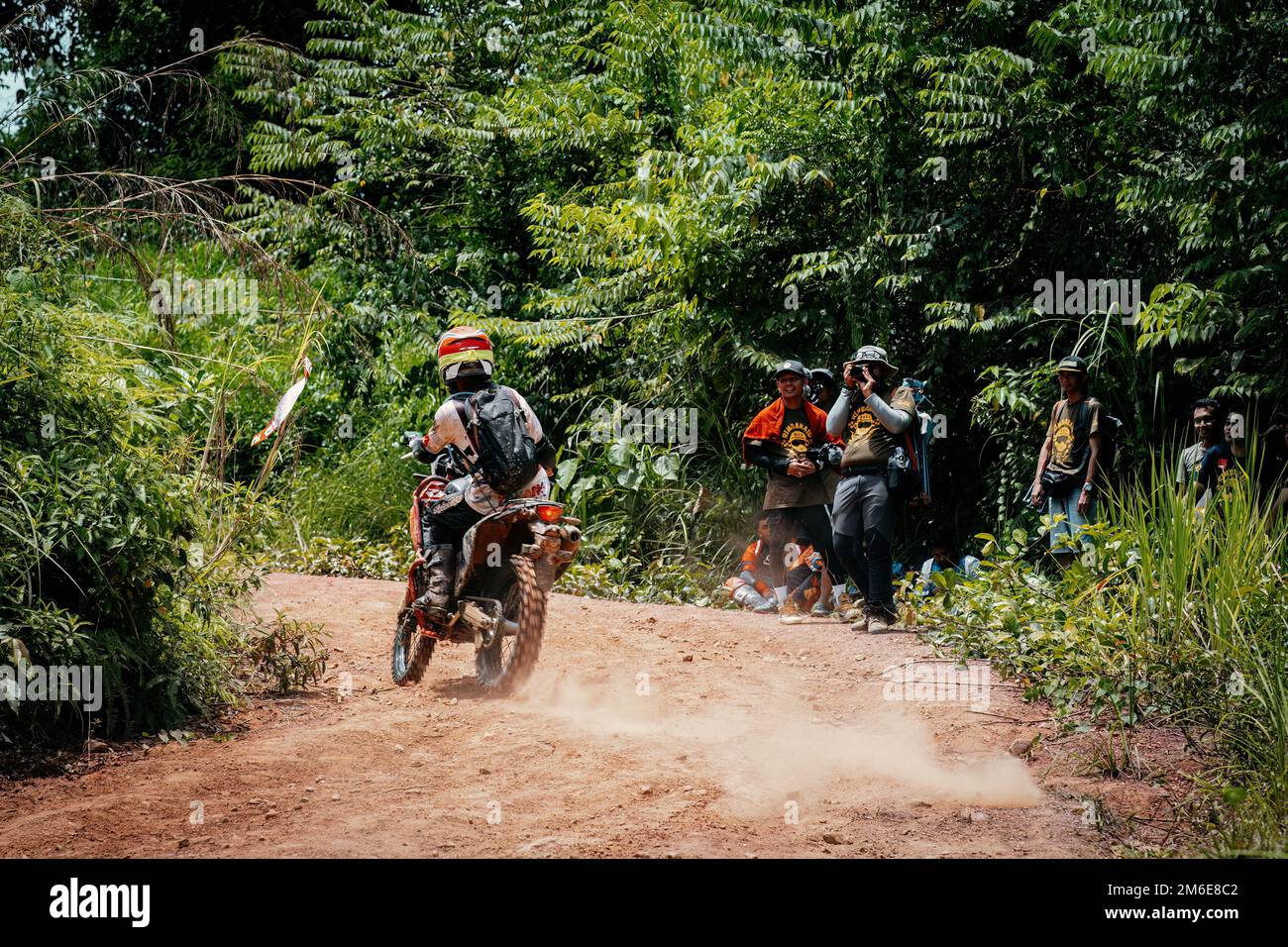 Pahang, Malaysia - Sept 24, 2022 Spectators taking photos of the Enduro ...