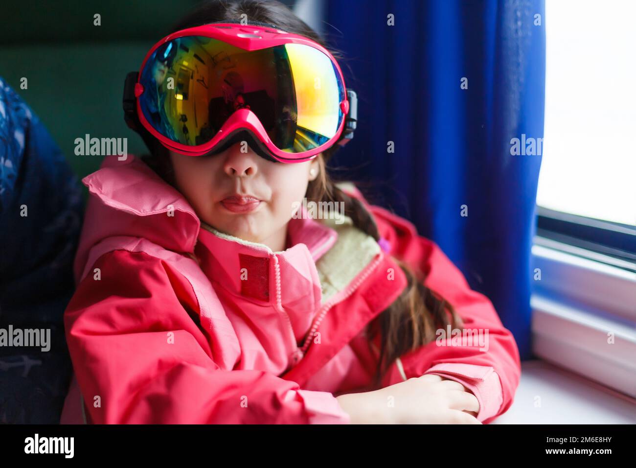 Child traveling by train. Little kid in a high speed express train on ...