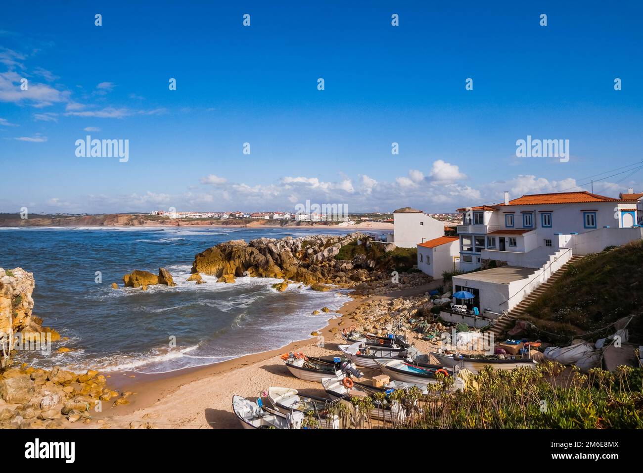 Fishermen and Fish Boats in a Small Rocky Bay in a Popular Surf Resort ...