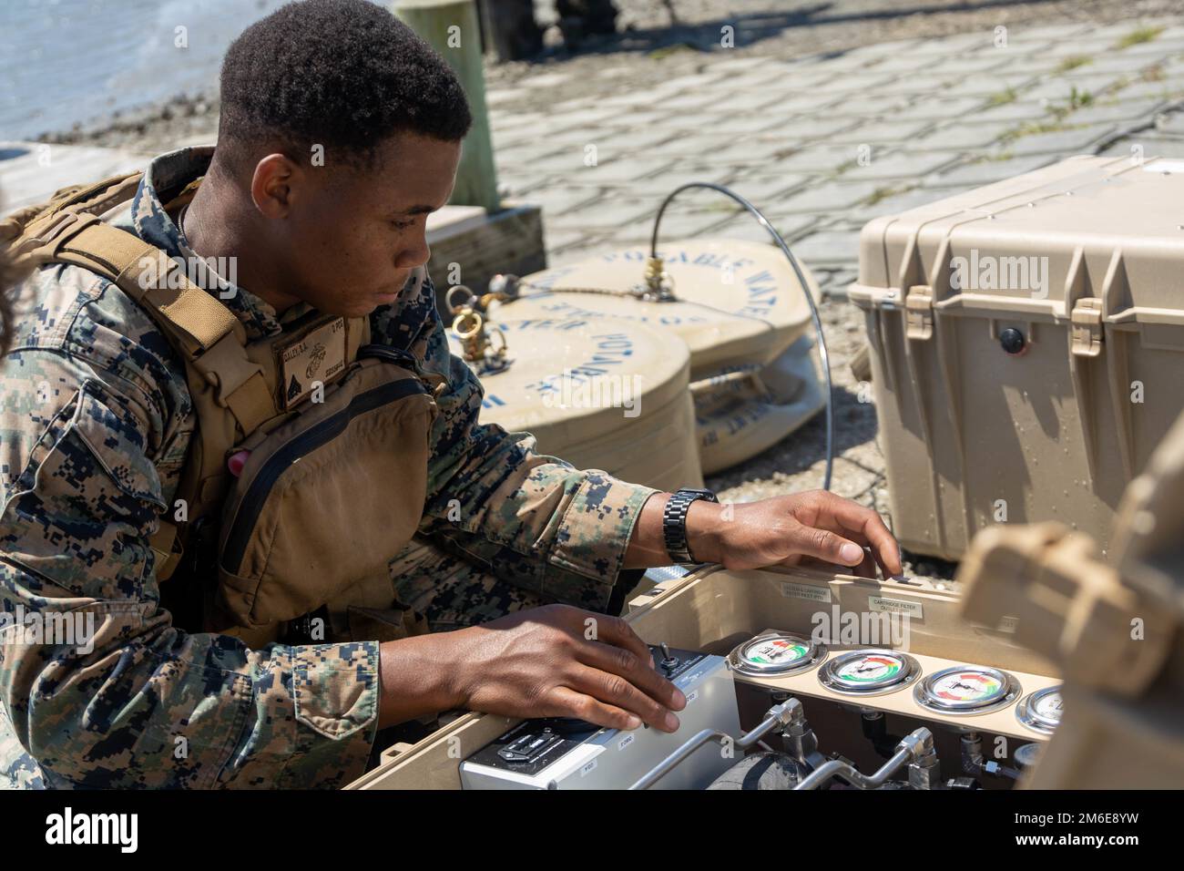 U.S. Marine Corps Cpl. Steven Daley, a water support technician with ...