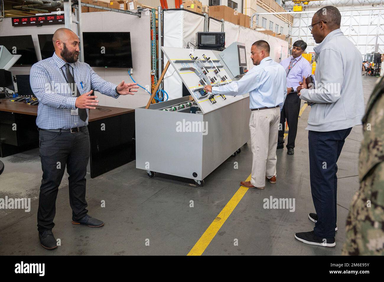 220426-N-GC965-0153 SAN DIEGO (April 26, 2022) Ronnie Locsin, left, lab manager for Public ...