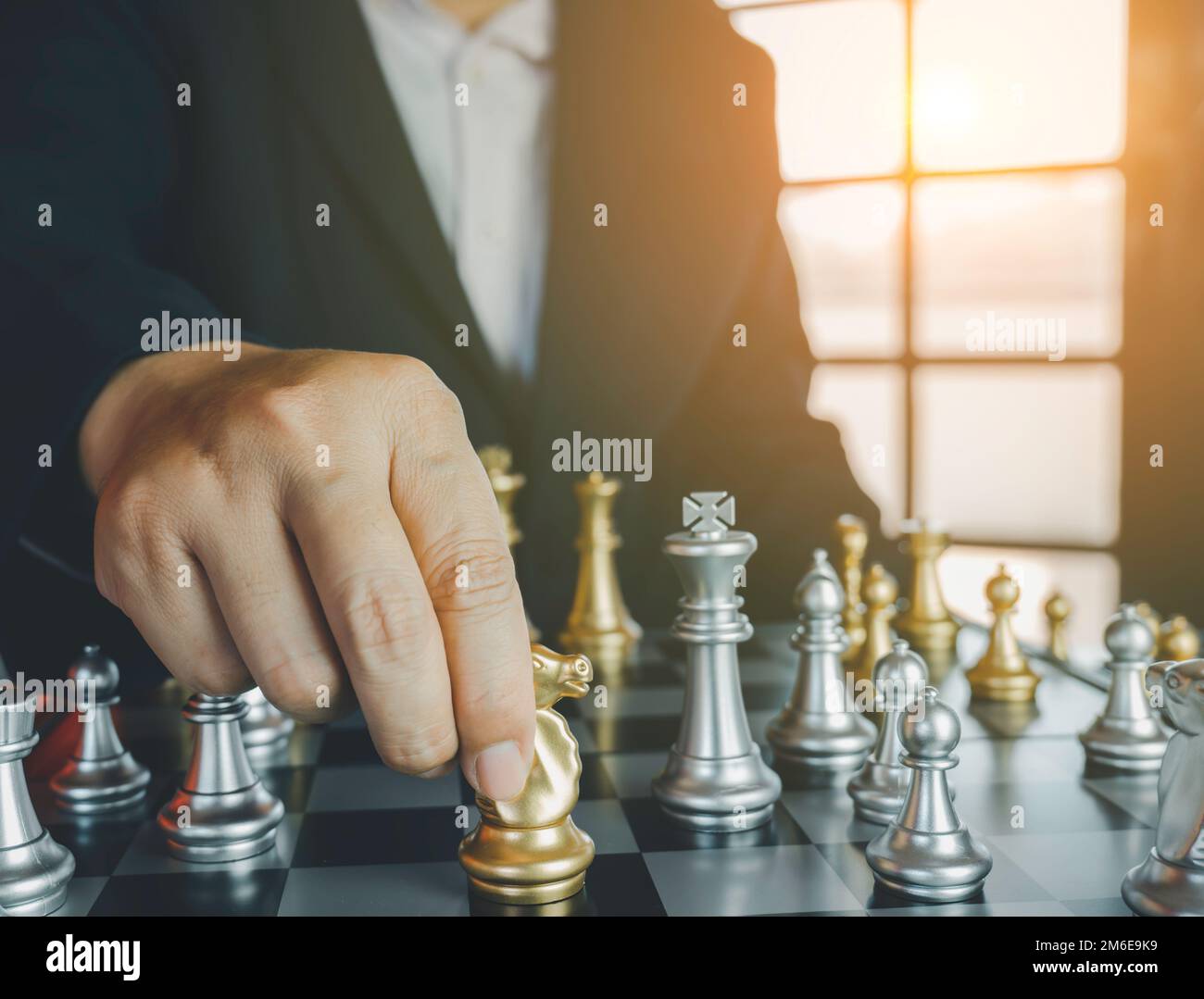 Concentrated businessman developing chess gambit, strategy ,playing ...