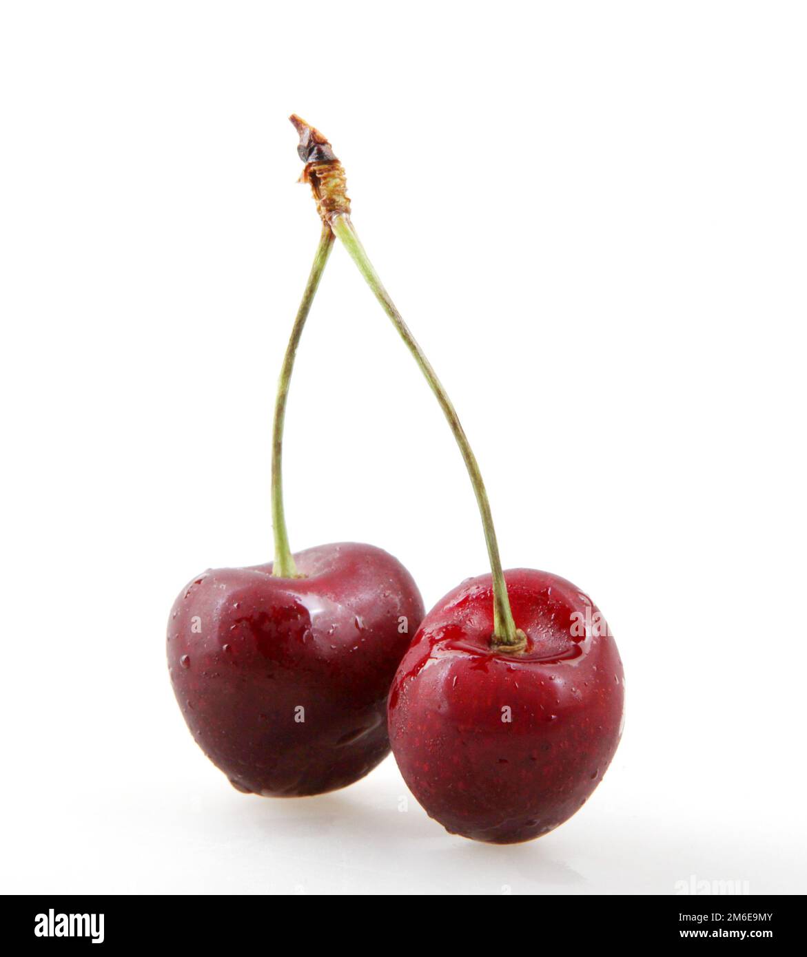 Sweet cherry isolated on white background. A cherry is the fruit of ...
