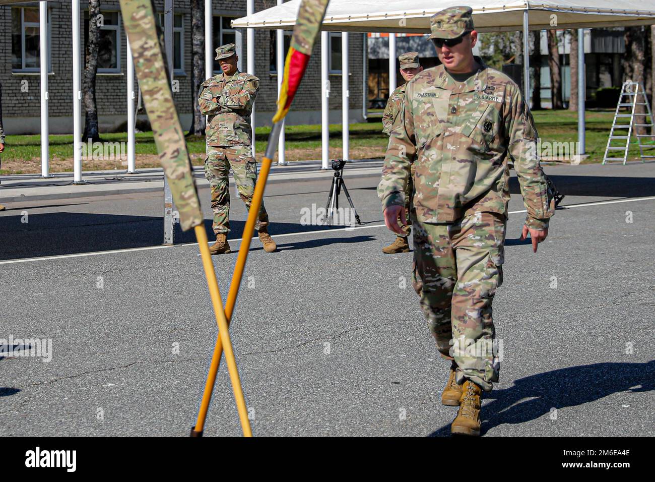 From left, U.S. Army Command Sgt. Maj. Rickey G. Jackson, command ...