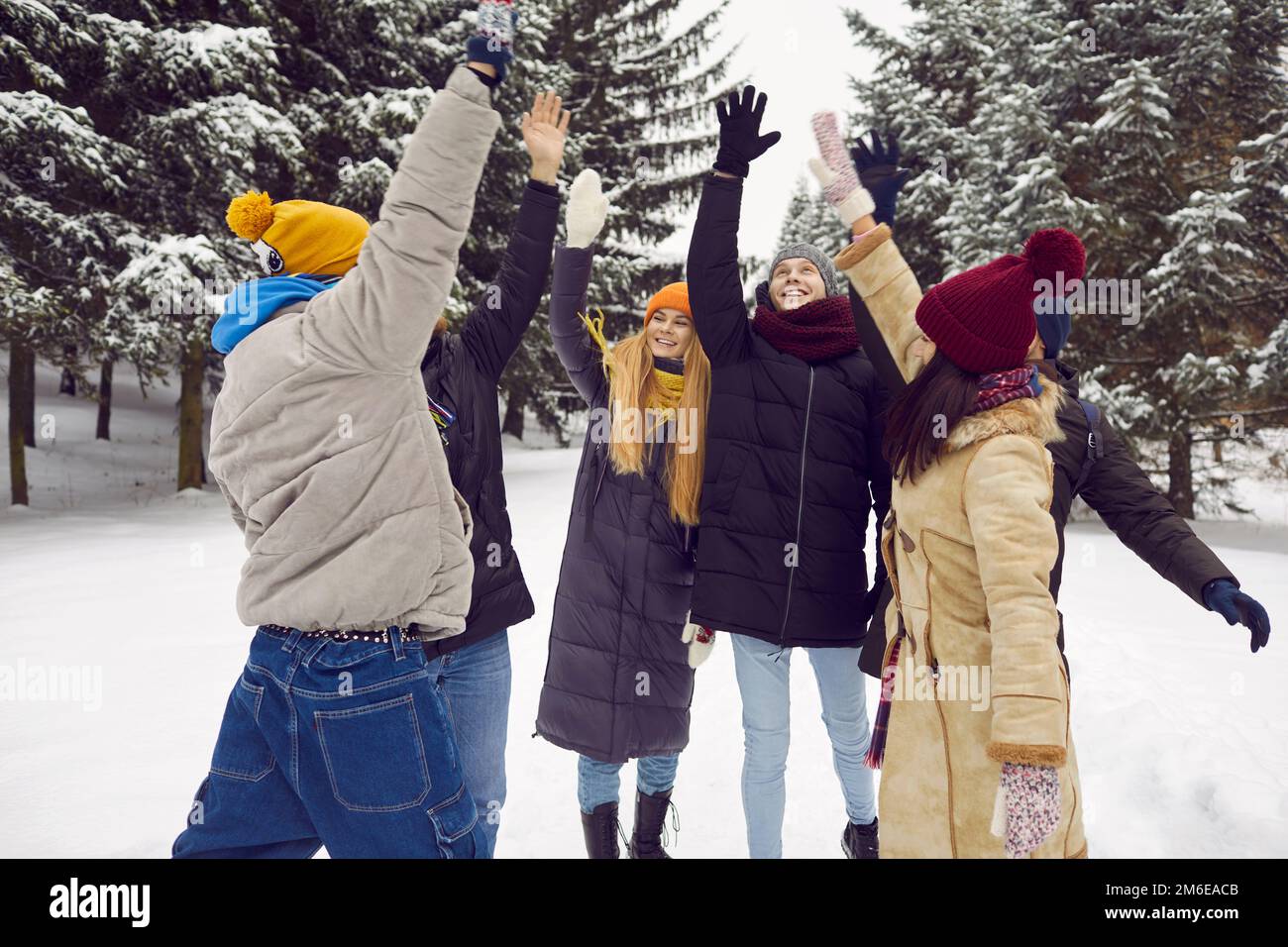 Group friends raise hands team hi-res stock photography and images - Alamy