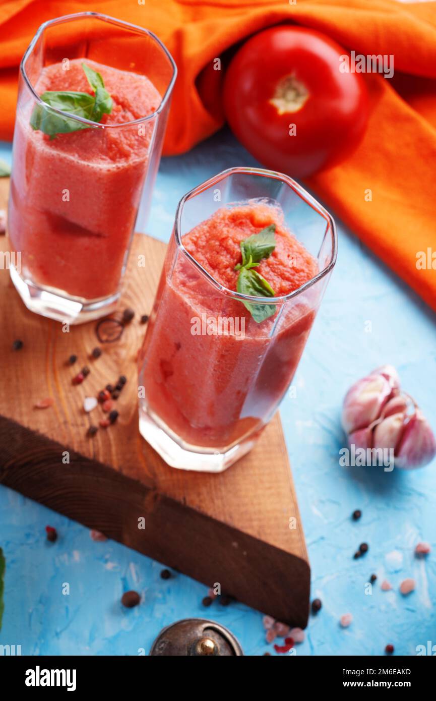 Classic spanish raw eating cold soup Gazpacho served in glasses. food ...