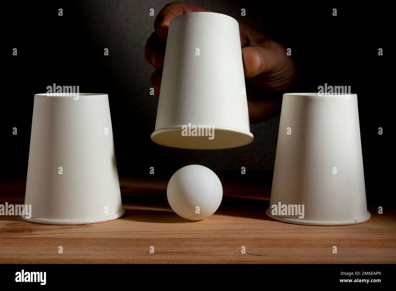 Disposable cups and ping pong ball Stock Photo - Alamy