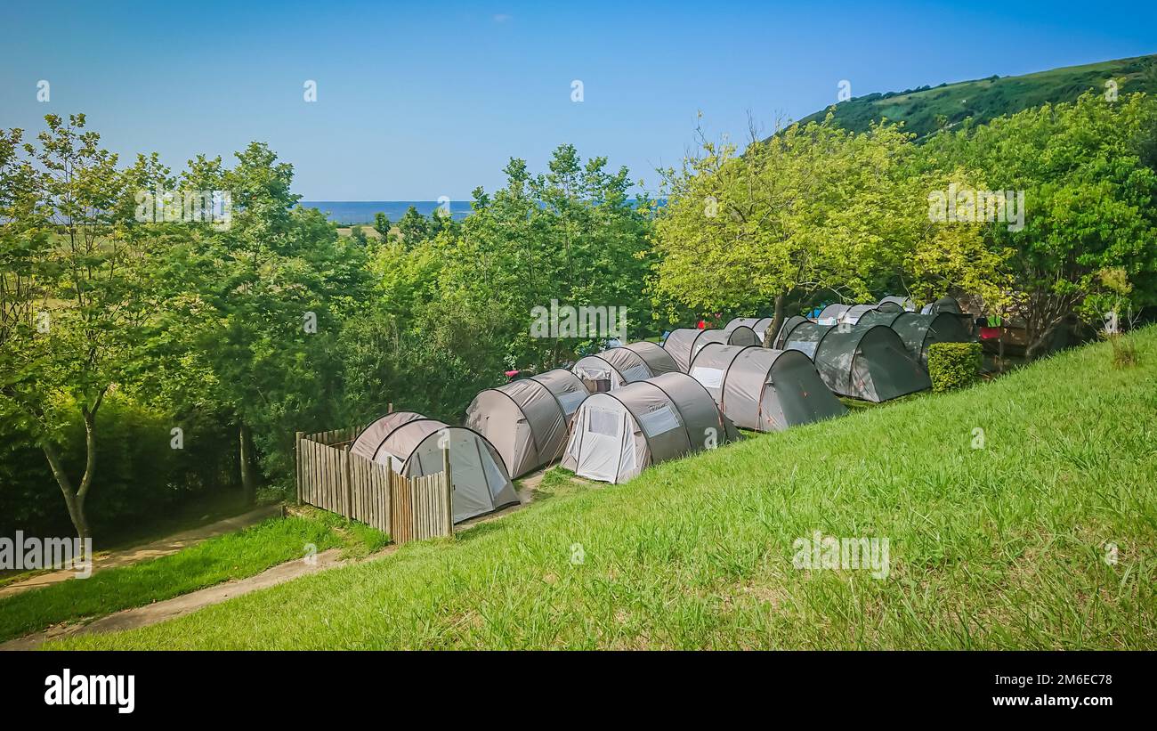 Group of tents in camping with beautiful view Stock Photo - Alamy
