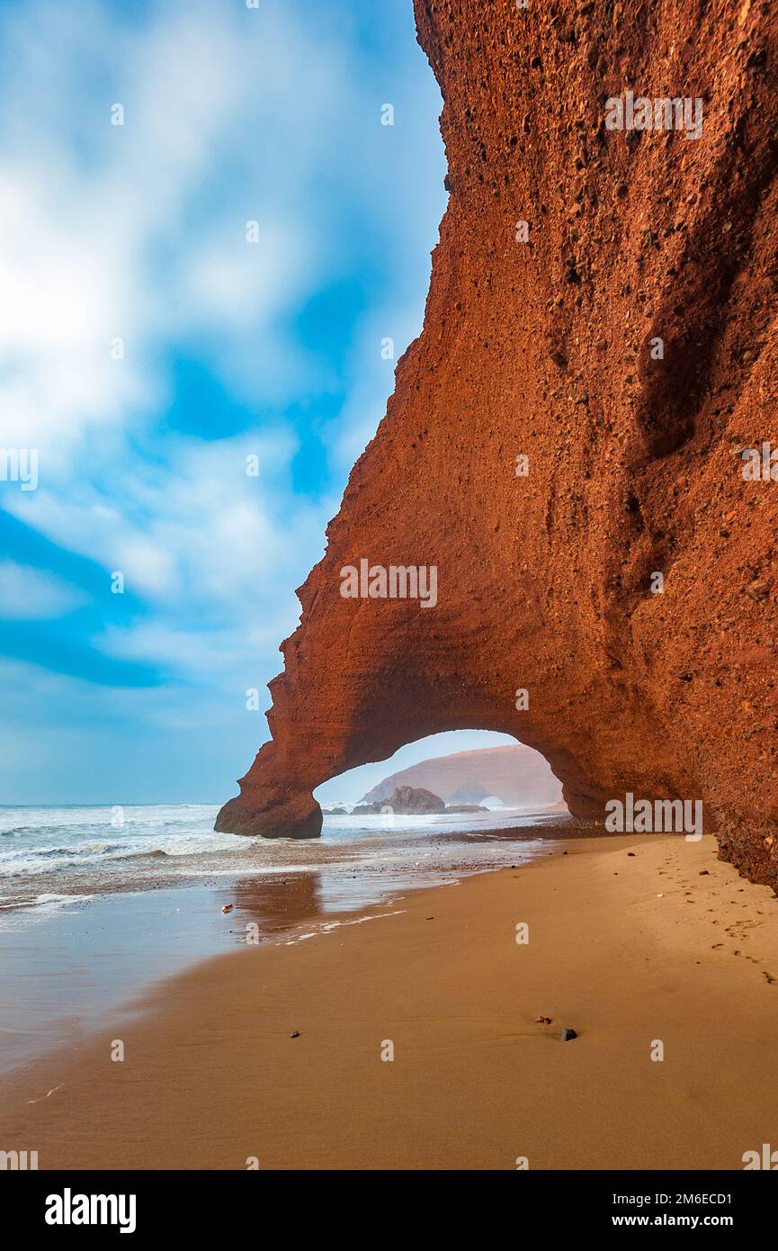 Red arches of Legzira beach, Morocco Stock Photo - Alamy