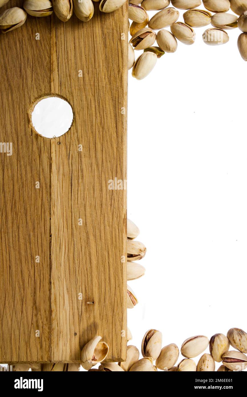 Cutting board and nuts Stock Photo - Alamy