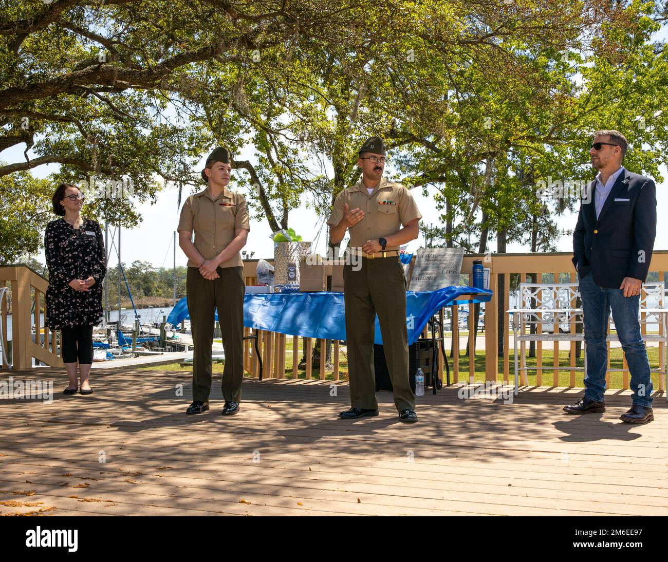 U.S. Marine Corps Capt. Adrian Adame speaks on the accomplishments of ...