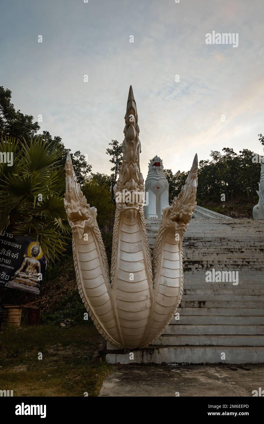 Pai, Thailand. November 20, 2022. Statues guarding the White Buddha ...