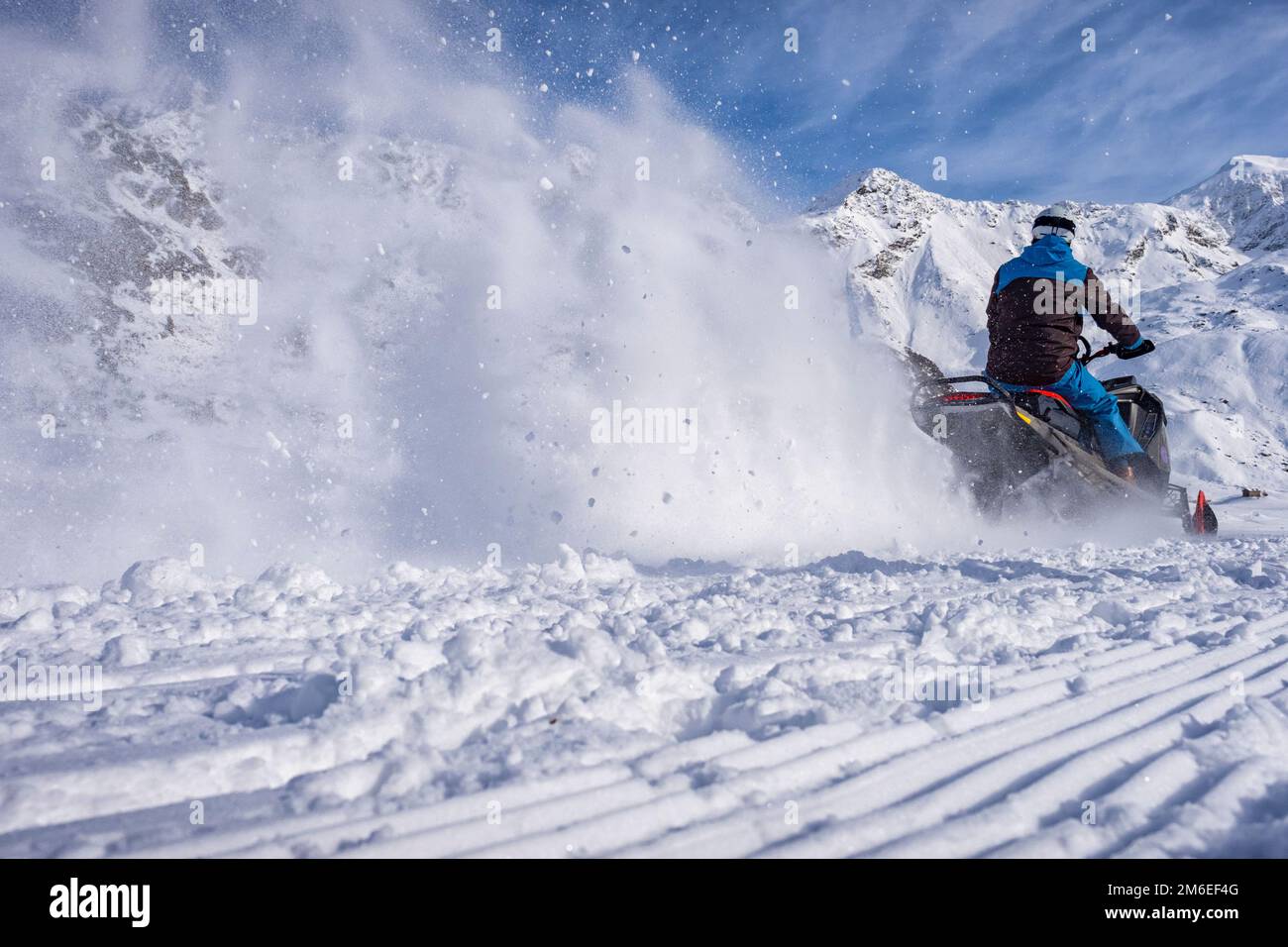 Snowmobiling alps hi-res stock photography and images - Alamy