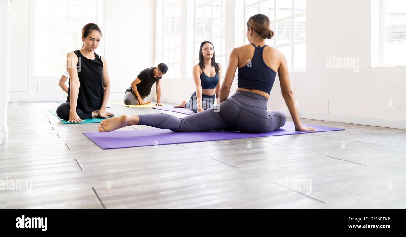 Panorama asian yoga instructor coach in Class Stock Photo - Alamy