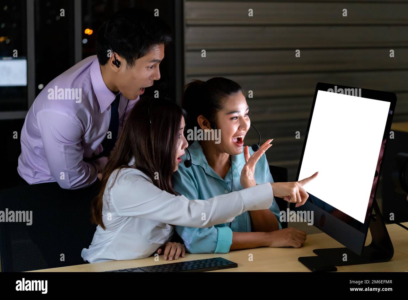 Call center team night working Stock Photo - Alamy