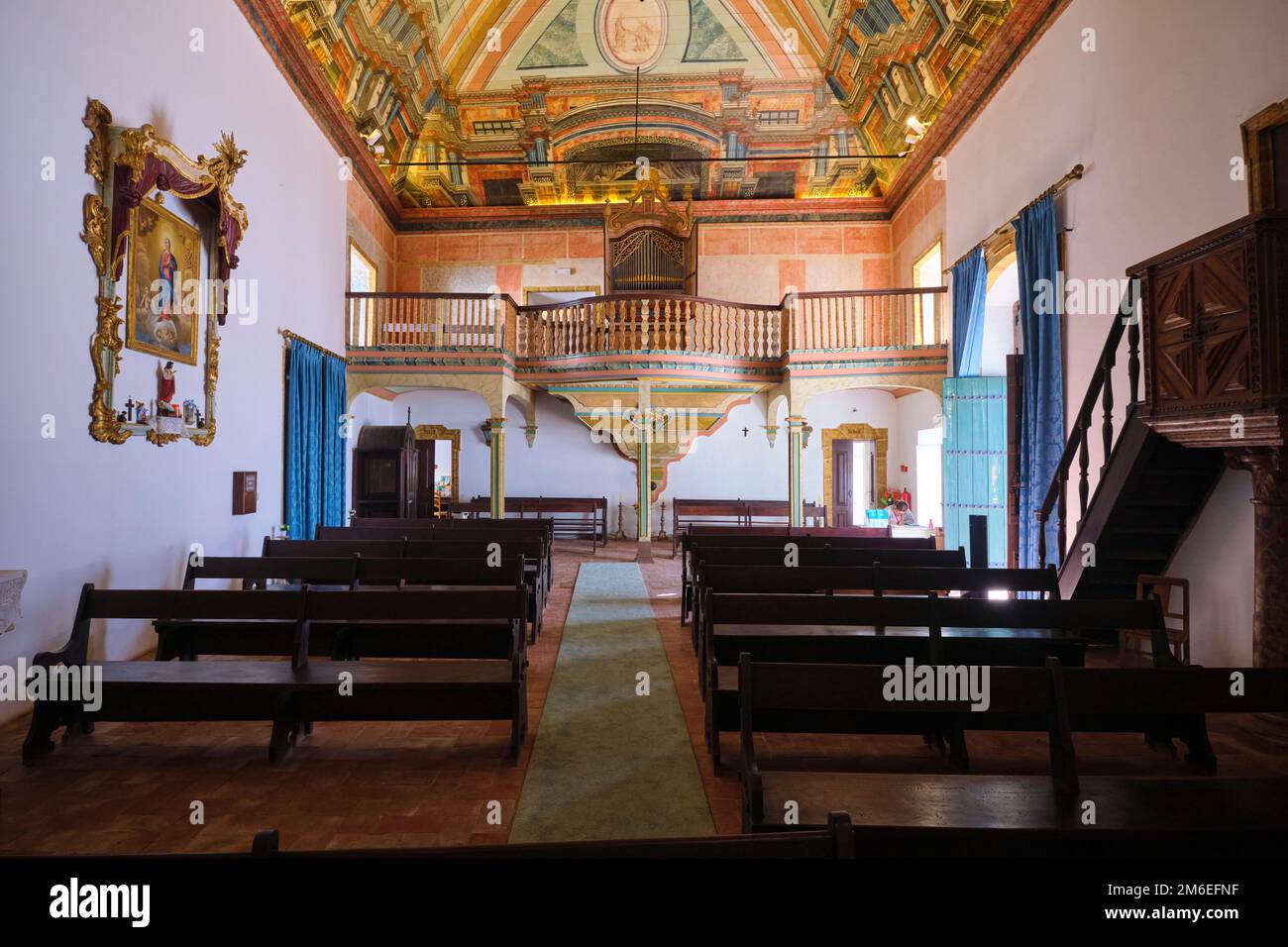 A view looking toward the back of the church, big organ in the wood ...