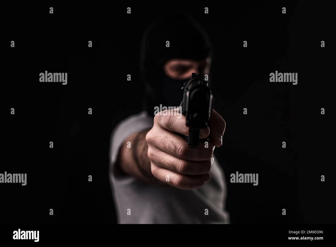Man aiming handgun camera hi-res stock photography and images - Alamy