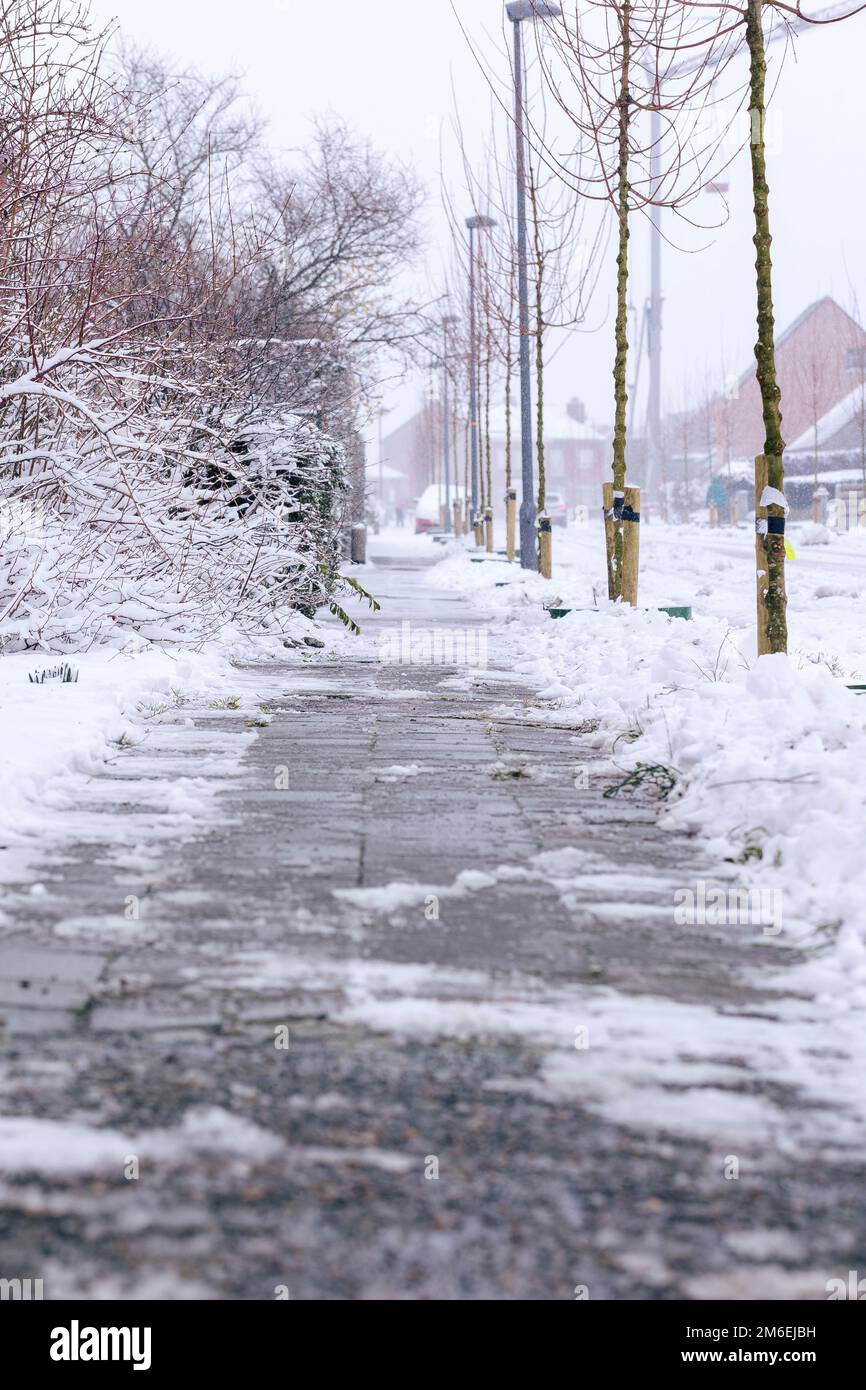 Pavement with icy footprints hi-res stock photography and images - Alamy