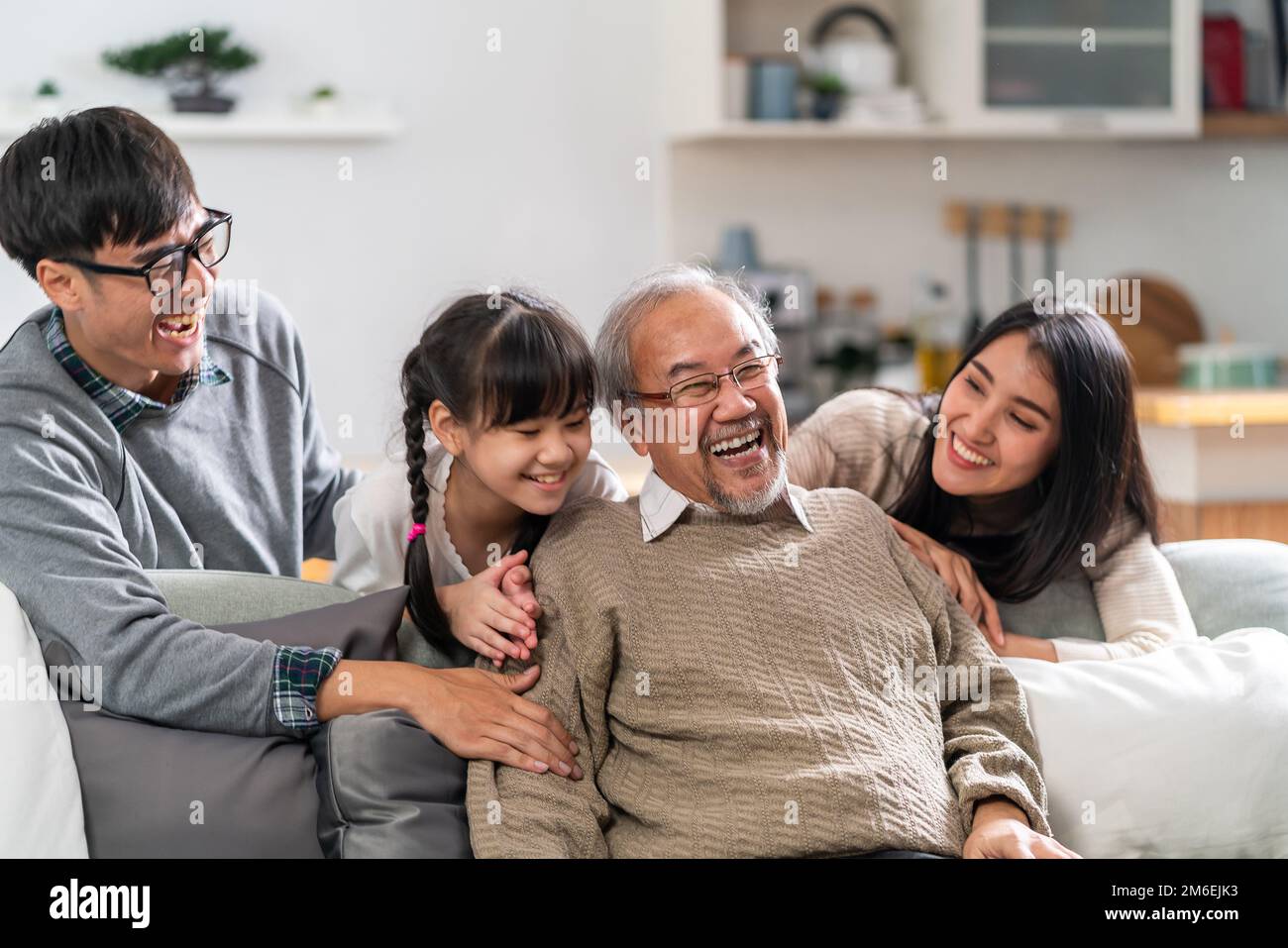 Happy multigenerational asian family portrait in living room Stock ...