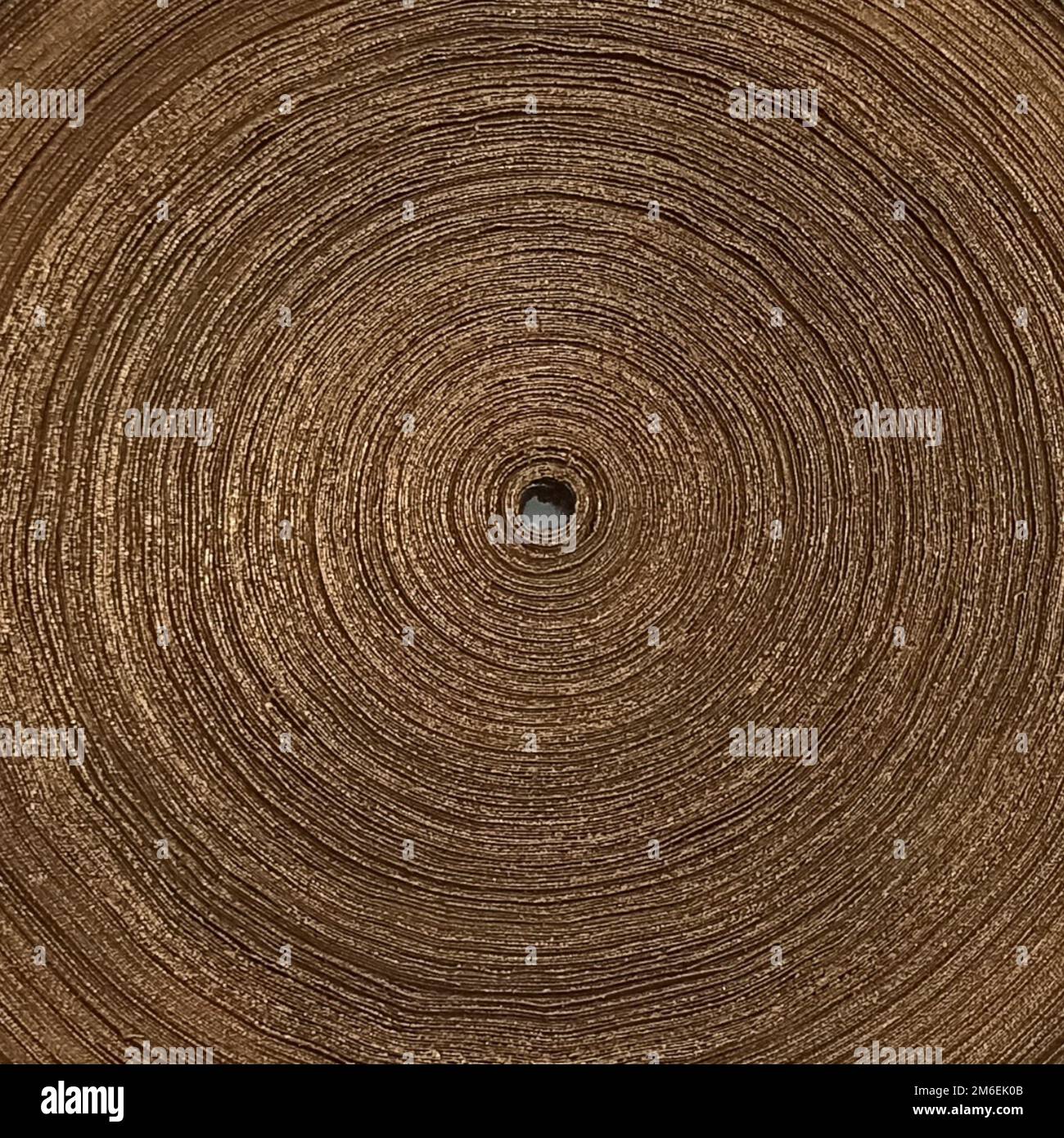 Round texture in the color of old gold. Golden abstract texture. Round ...