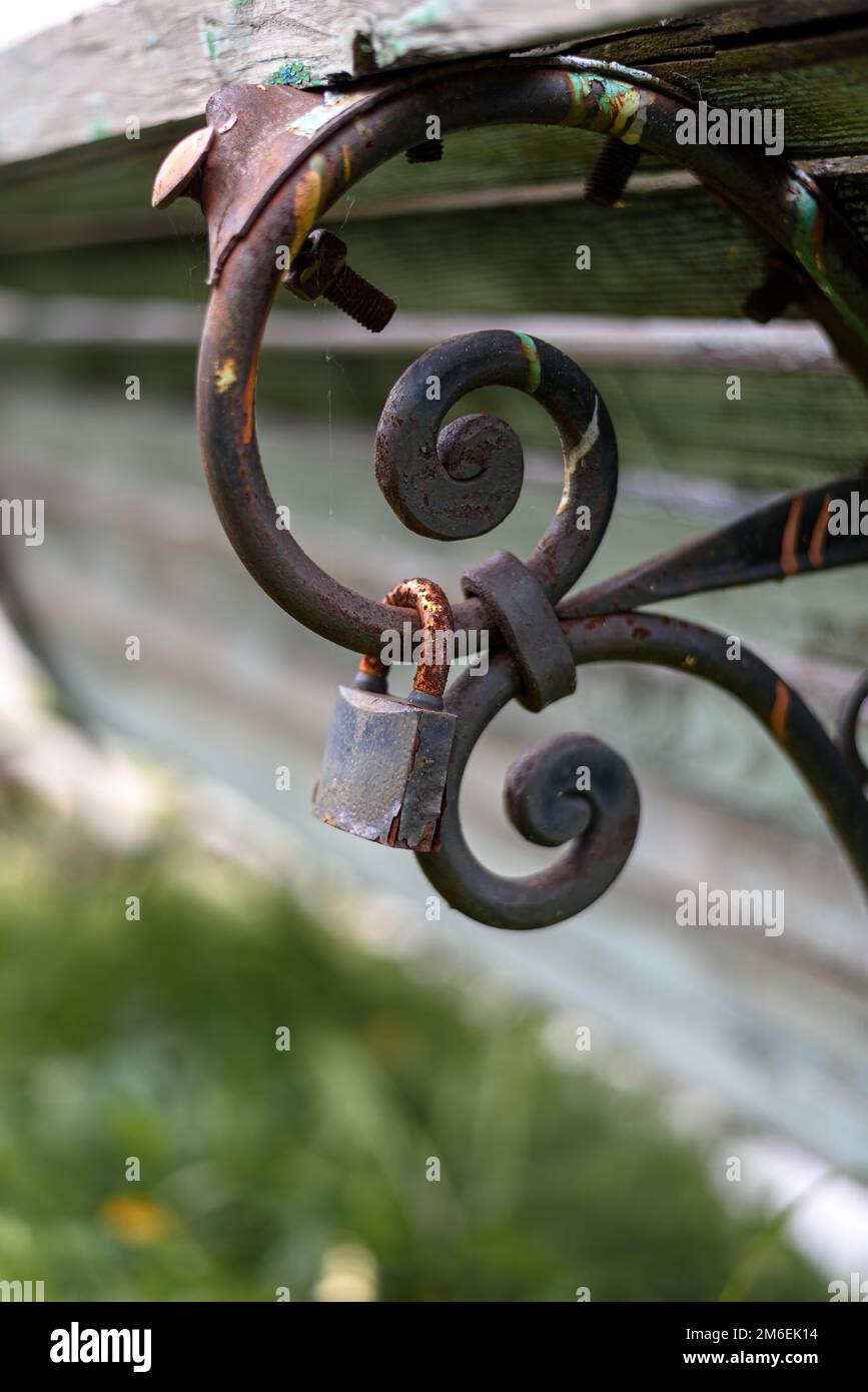 Lock hangs on iron hi-res stock photography and images - Alamy