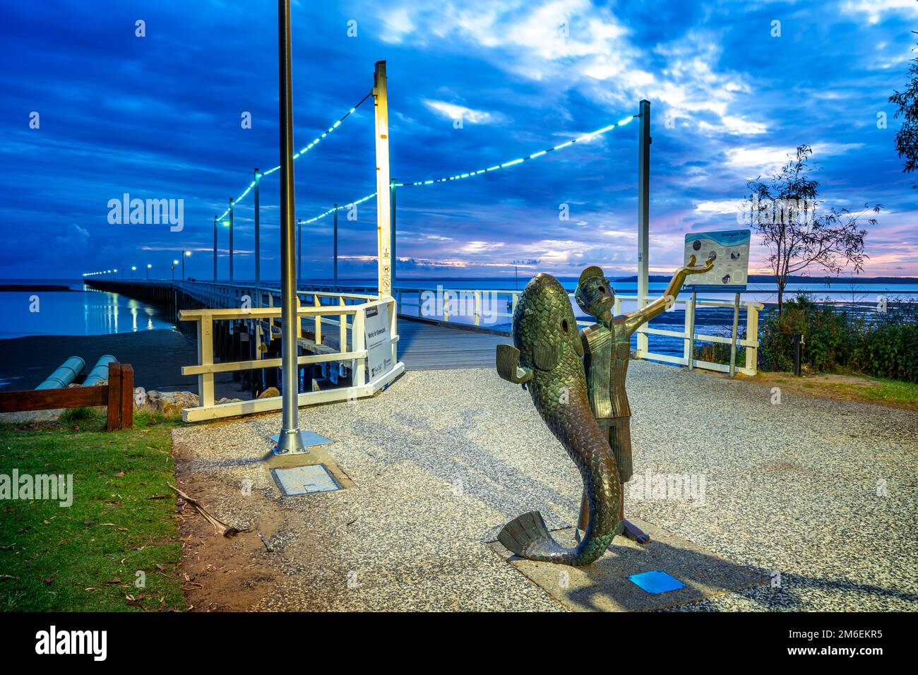 The Boy and the Fish sculpture at the entrance to historic Urangan pier ...