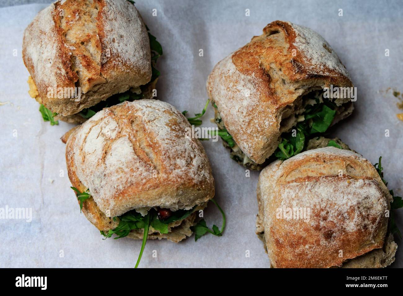 Top view of sandwich rolls with Dutch cheese and rocket salad Stock ...