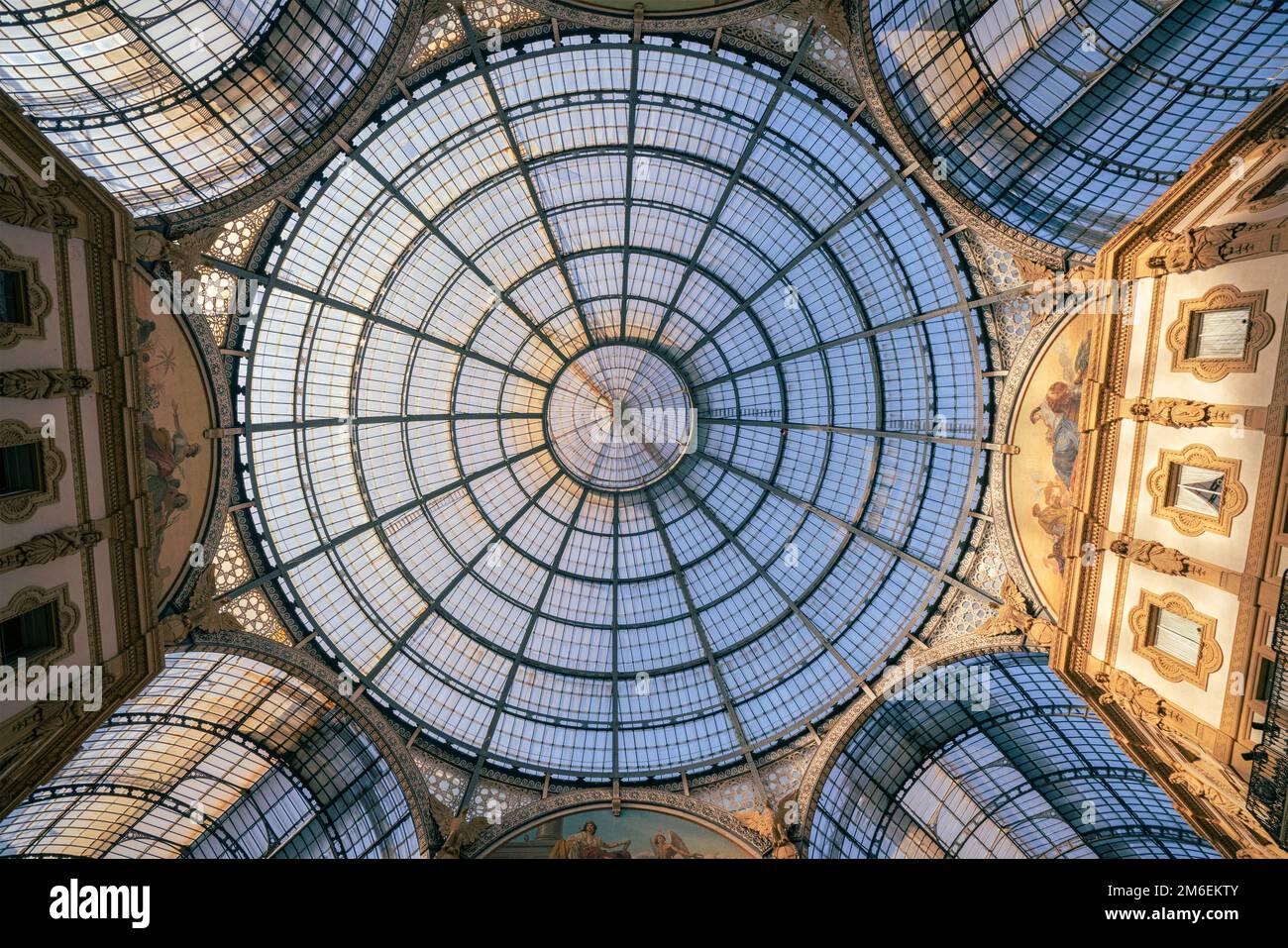 Abstract ceiling architecture with a symetric pattern and a glass roof ...