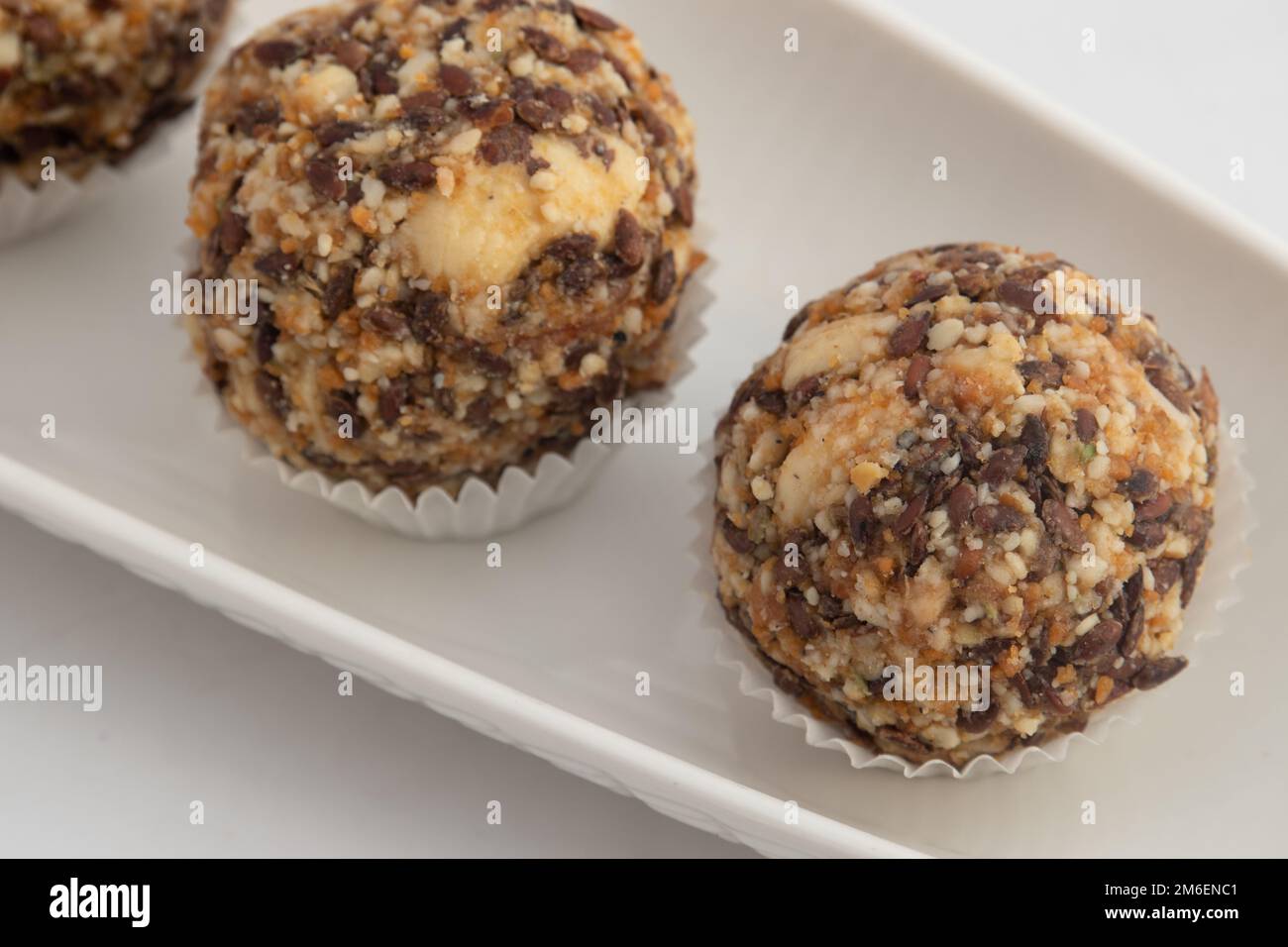 Flaxseed And Sesame Ladoo Also Known As Alsi Til Badam Ladddu Or Ellu ...