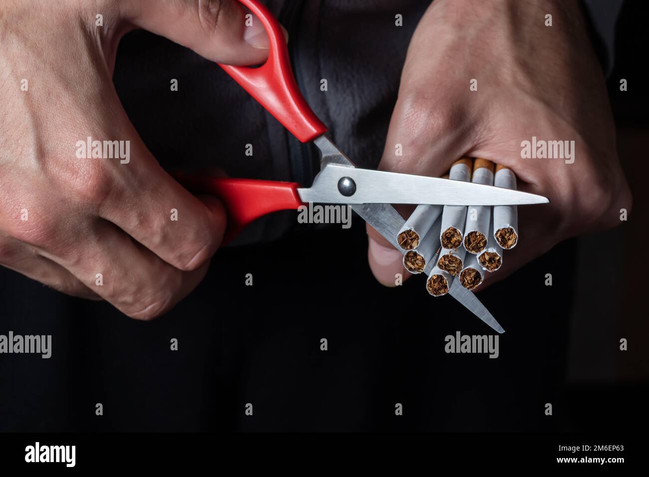 Quit smoking scissors cut cigarette hi-res stock photography and images ...