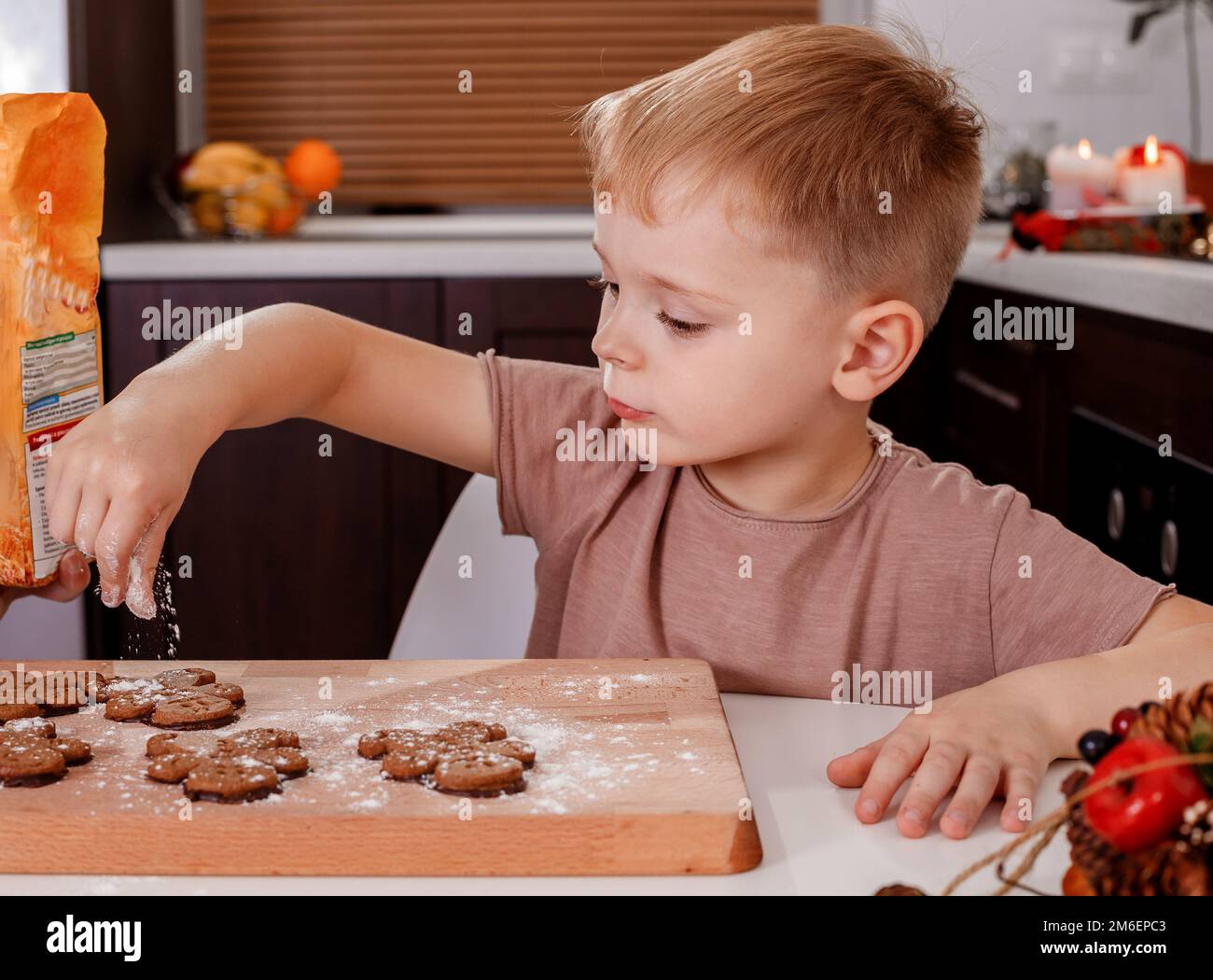 Little boy painting gingerbread man. Handmade Christmas gift ideas ...