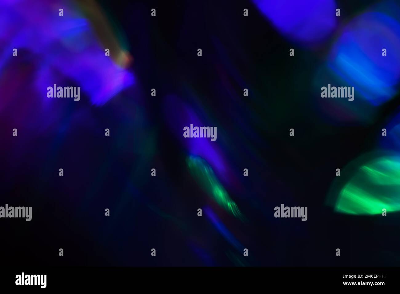 Abstract blurred colorful lens flare bokeh on black Stock Photo - Alamy