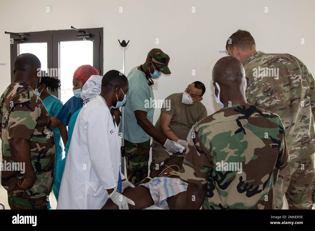 U.S. Army Capt. Matthew Gomberg, right, a battalion physician assistant ...