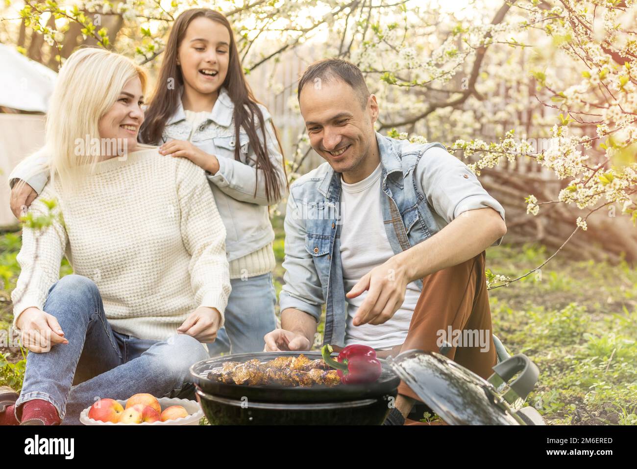 Barbecue family garden together generation party hi-res stock ...