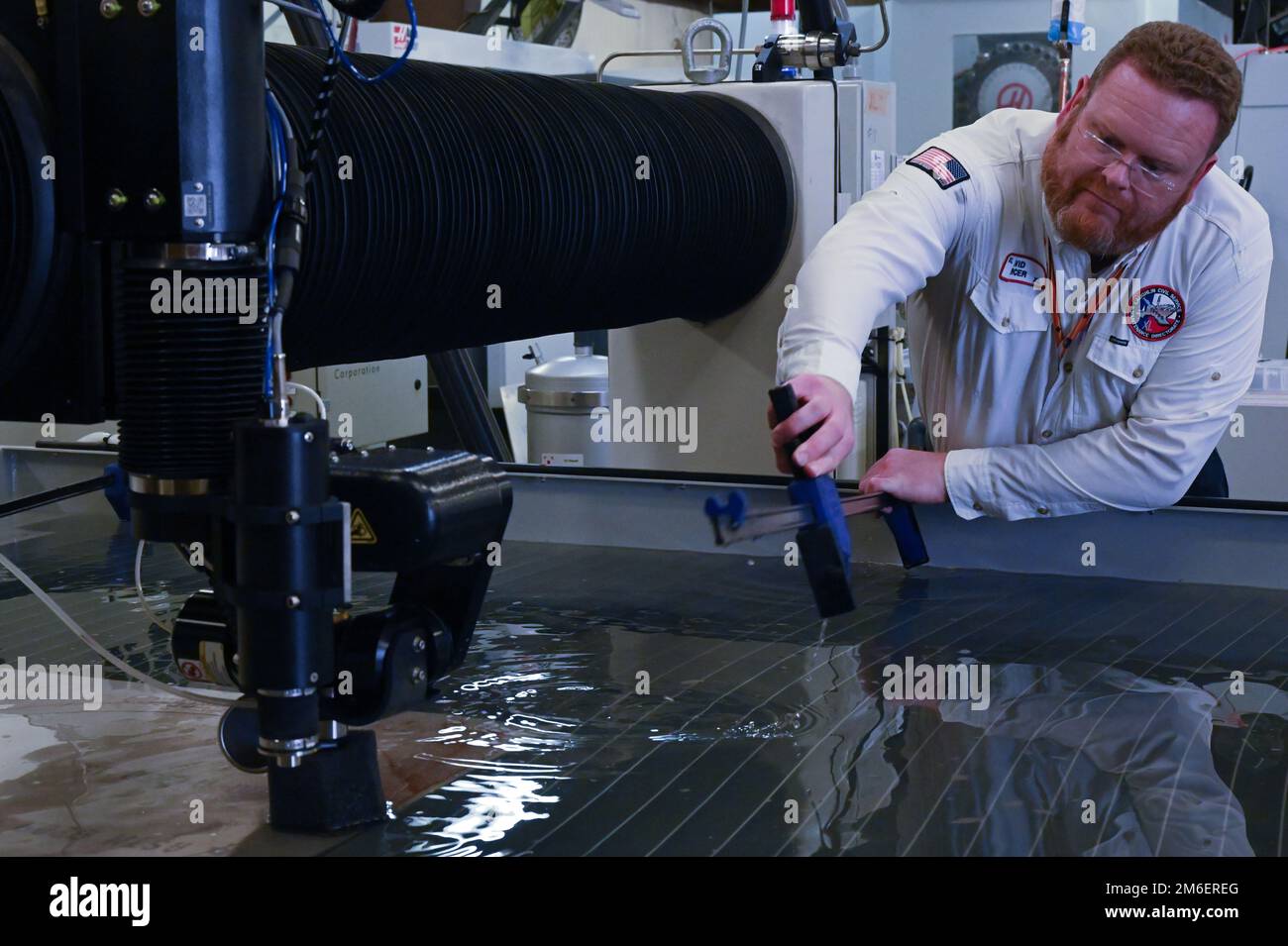 David Mercer, 47th Flying Training Wing fabrication supervisor, removes ...