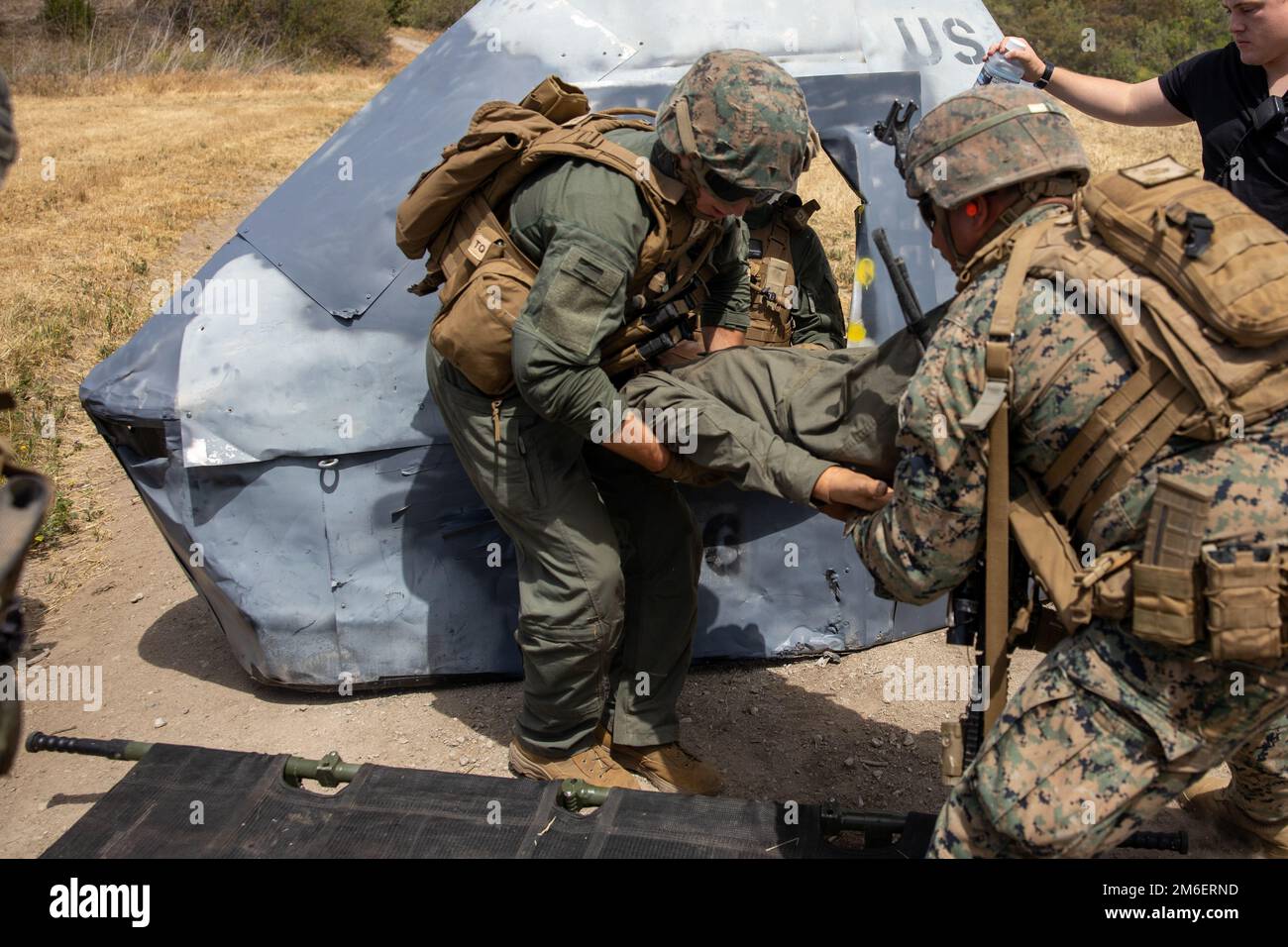U.S. Marines with the 13th Marine Expeditionary Unit, recover a ...