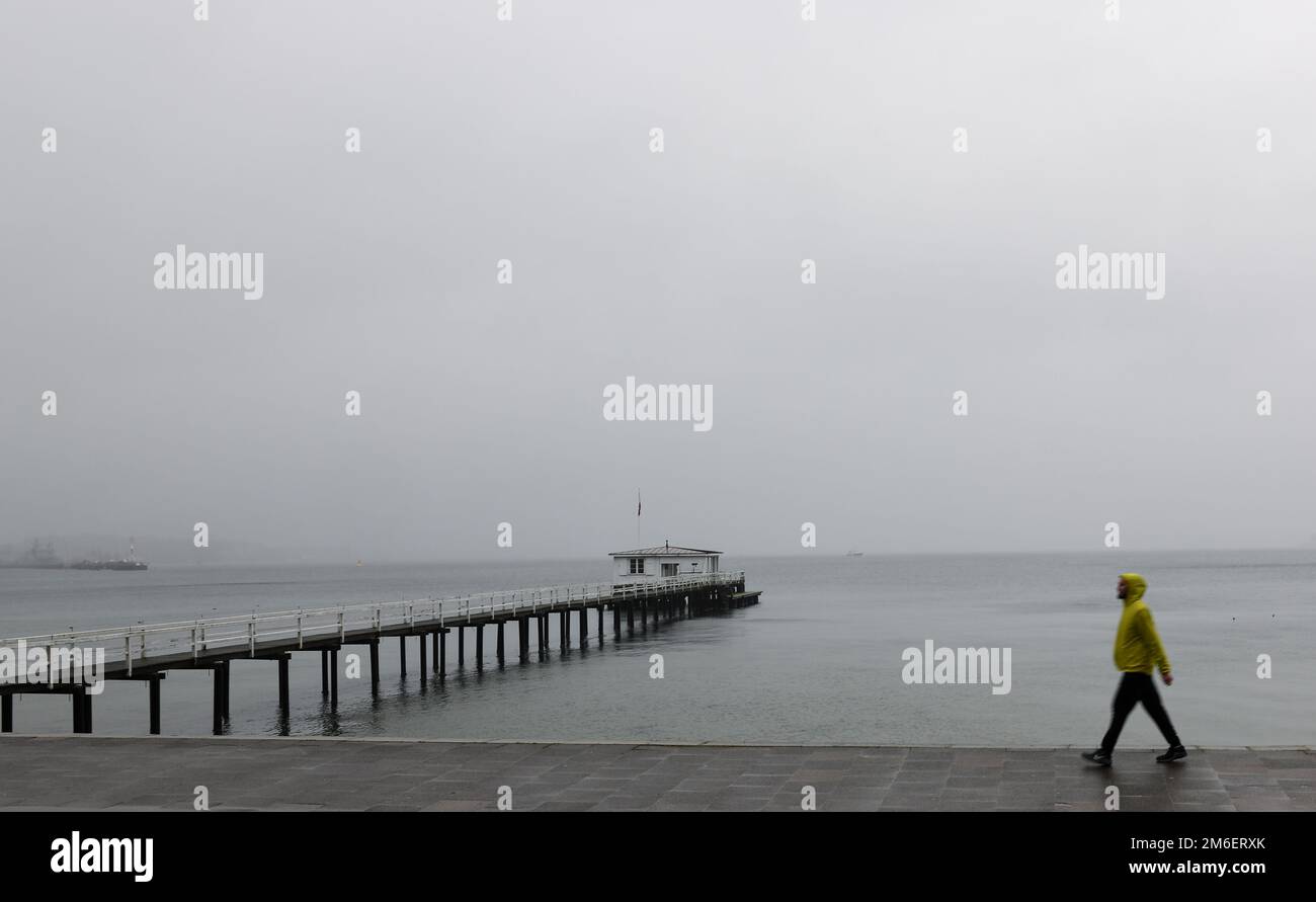 Kiel, Germany. 04th Jan, 2023. A walker is on the Kiellinie at the Kiel ...