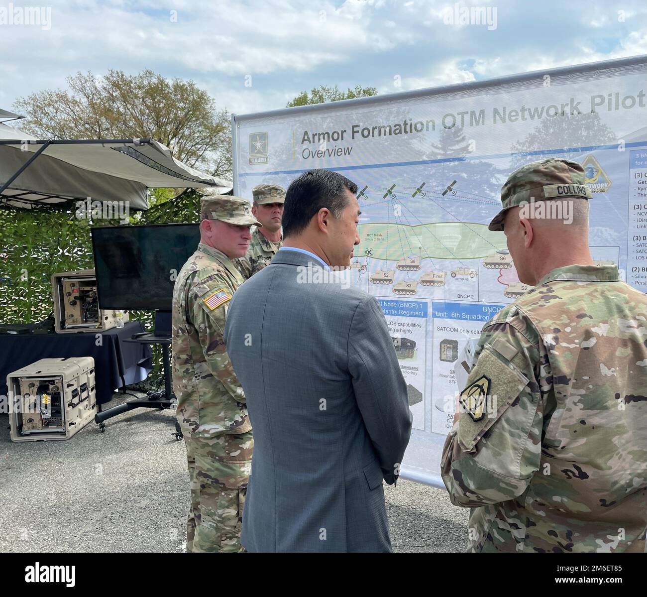 Maj. Gen Robert M. Collins, right, Program Executive Officer for ...