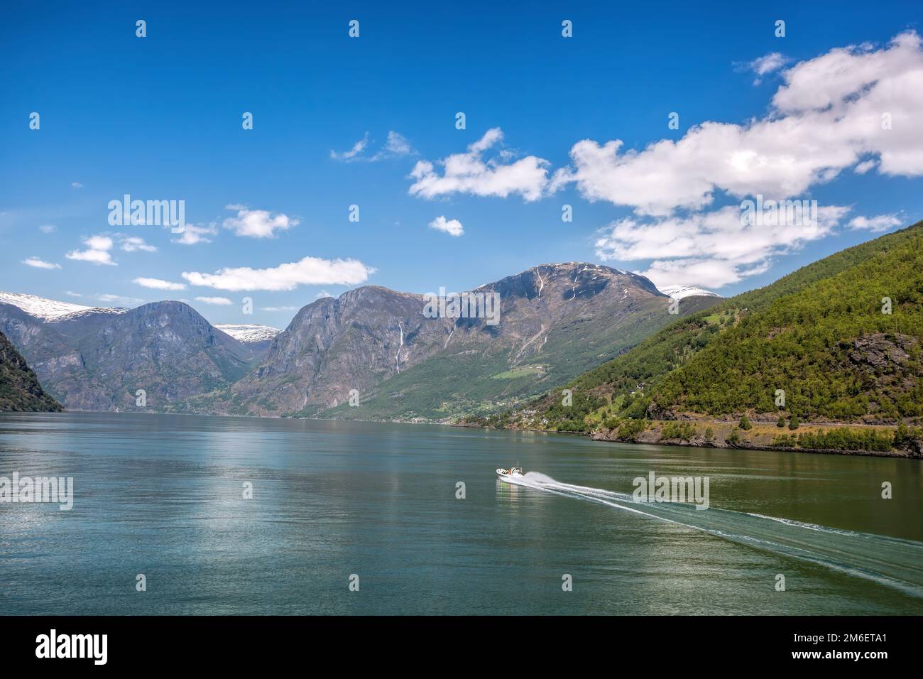 Port of Flam with tourist boat in the fjord, Norway Stock Photo - Alamy