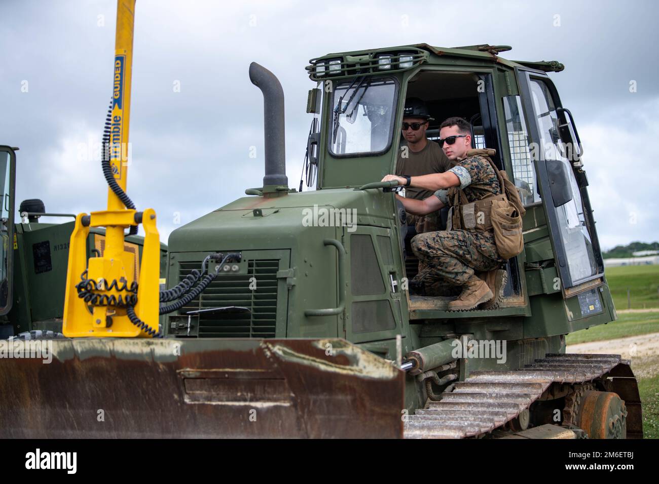 Airman 1st Class Ian Mitchell, left, 18th Civil Engineer Squadron ...