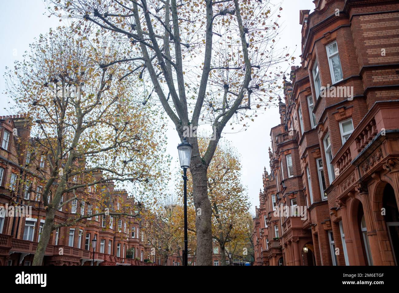 Attractive street of residential terraced mansion buildings in ...