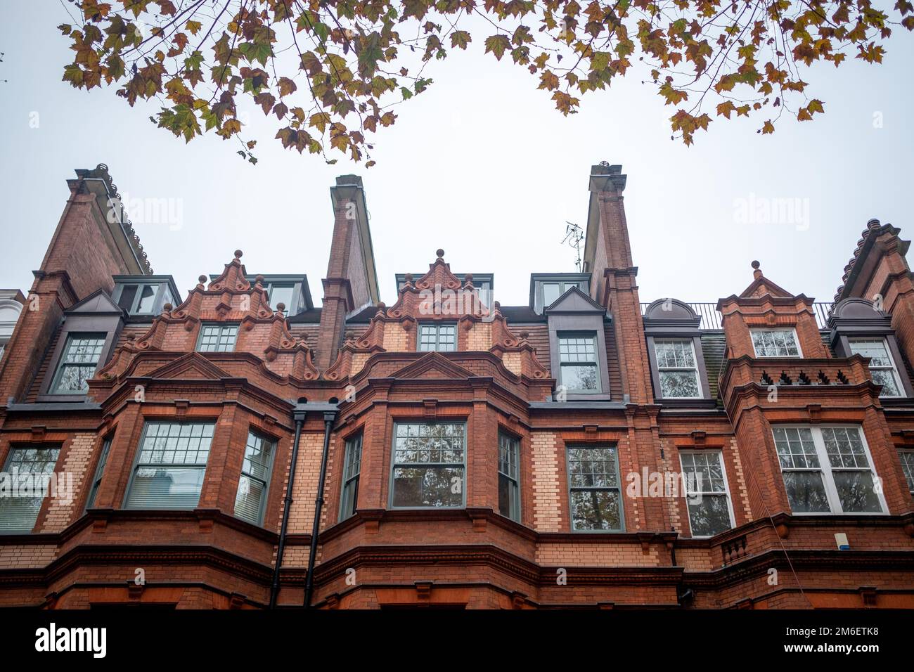 Attractive street of residential terraced mansion buildings in ...