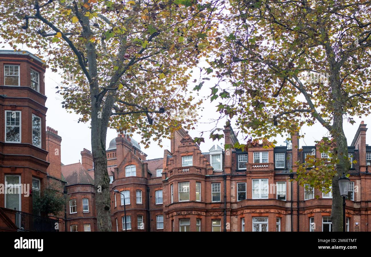 Attractive street of residential terraced mansion buildings in ...