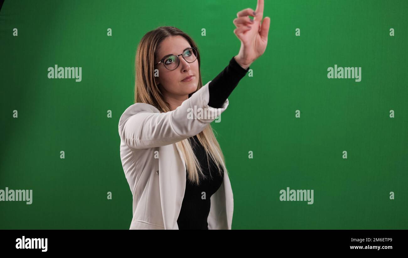 Woman taps tablet holding hi-res stock photography and images - Alamy
